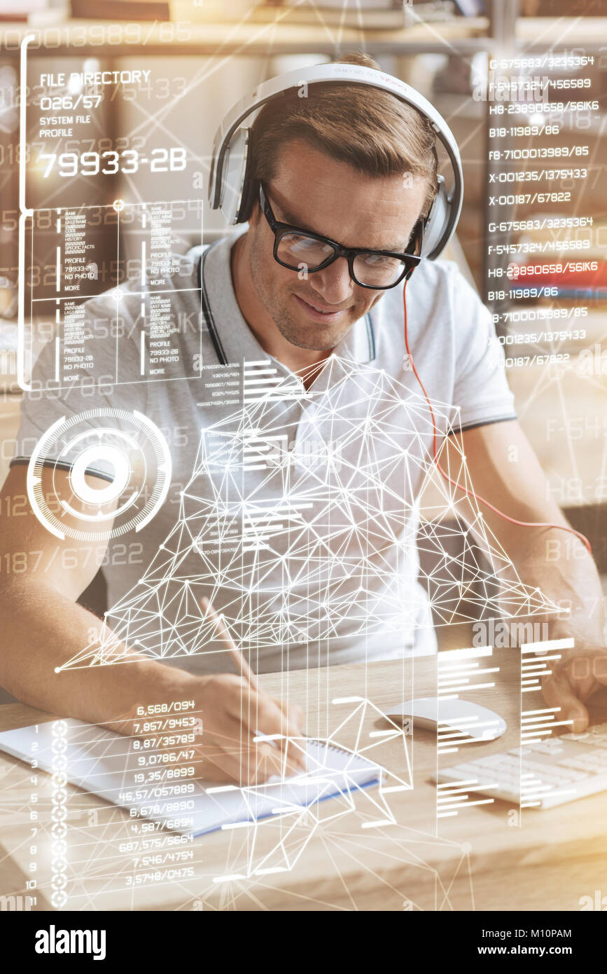 Young engineer typing code hi-res stock photography and images - Alamy