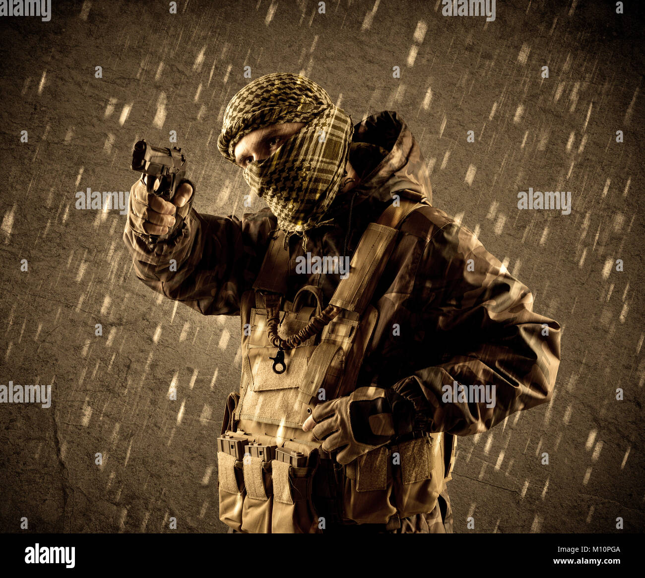 Portrait of dangerous heavily armed terrorist soldier with mask on ...