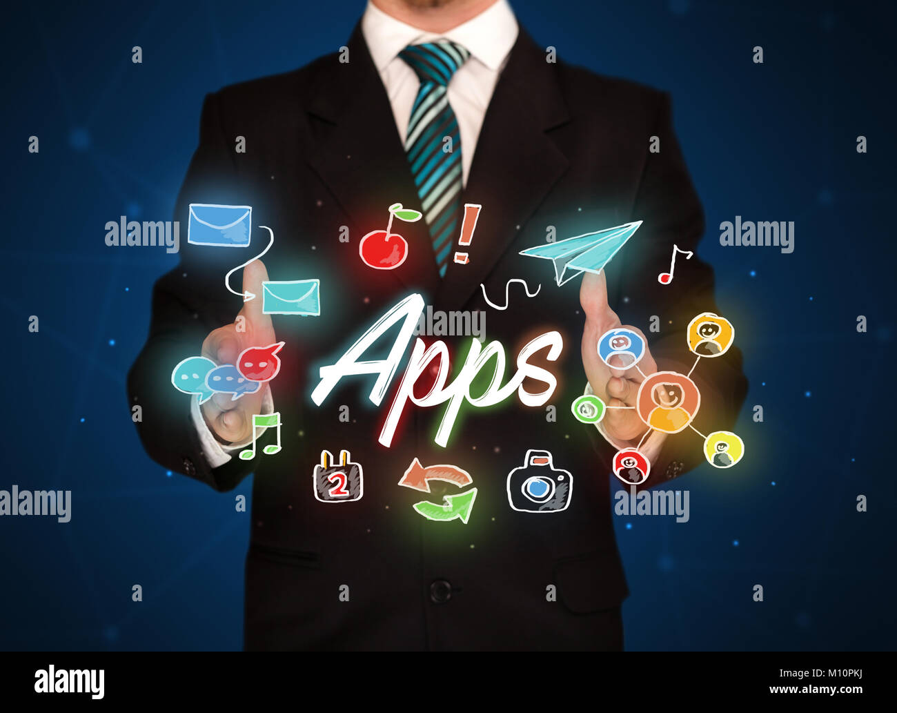 Businessman with drawn application icons and symbols in his hands Stock ...
