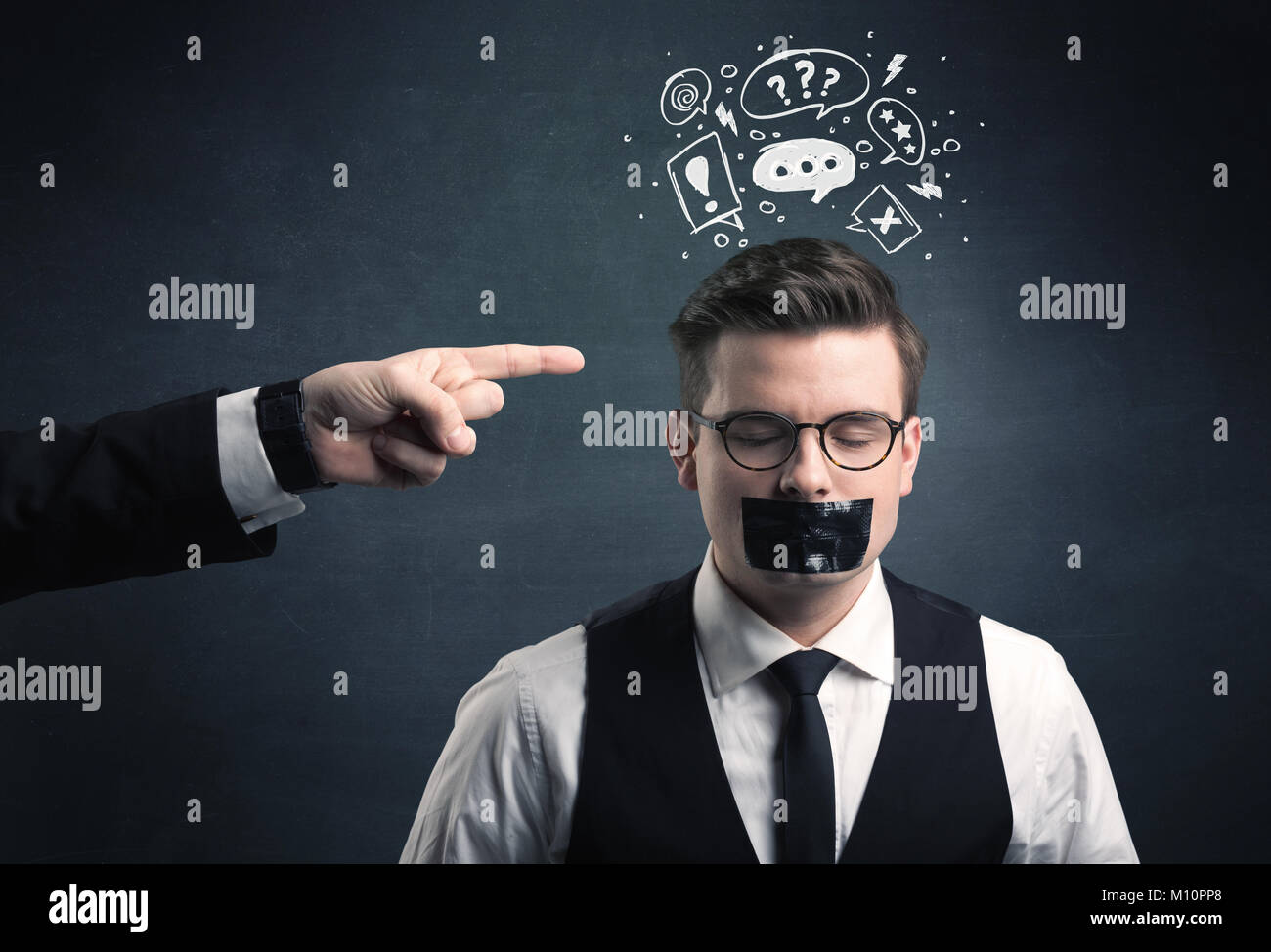 Caucasian business hand pointing at stressed male employee with drawn ...