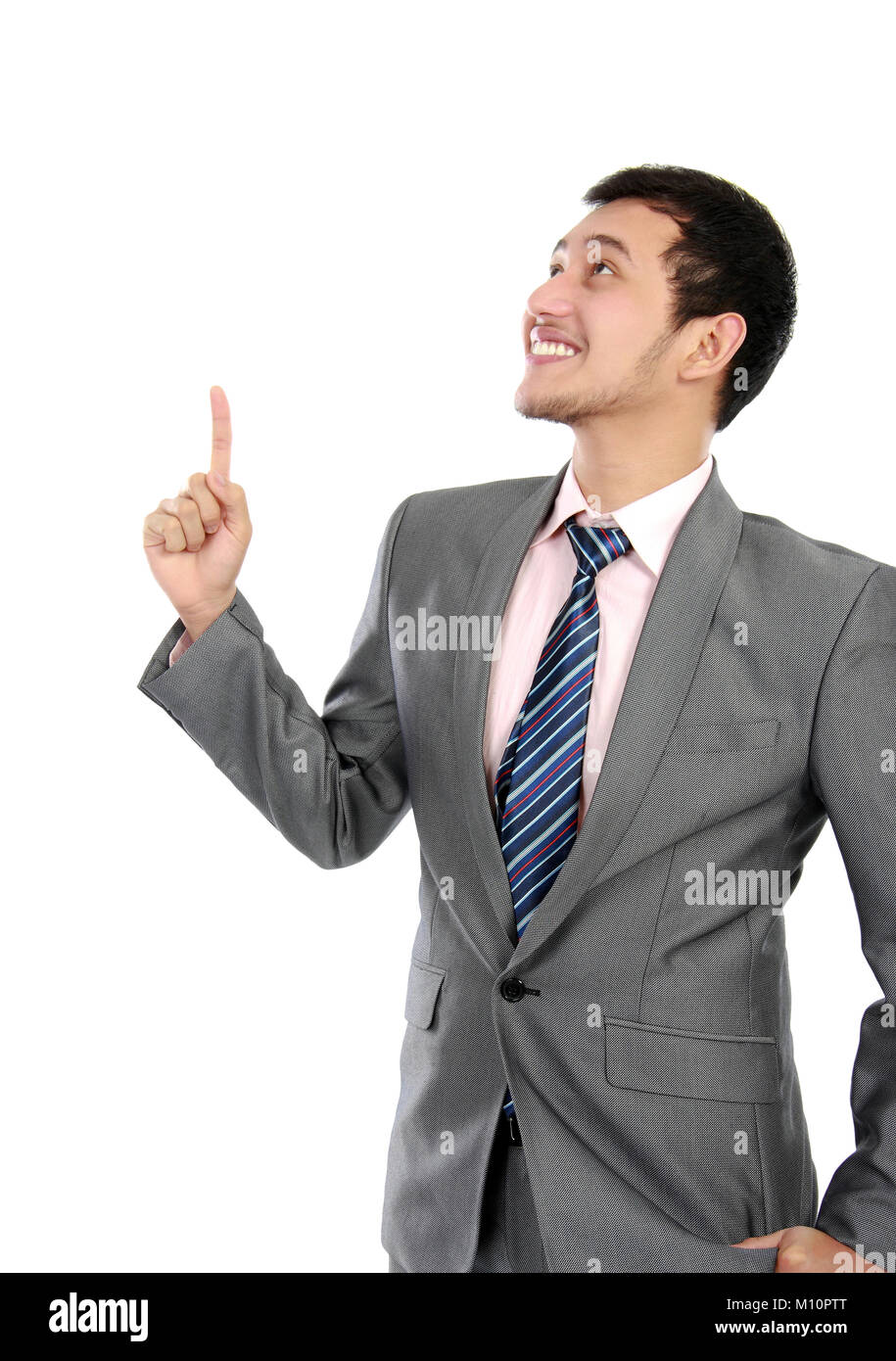 Portrait of a handsome young business man pointing something on white ...