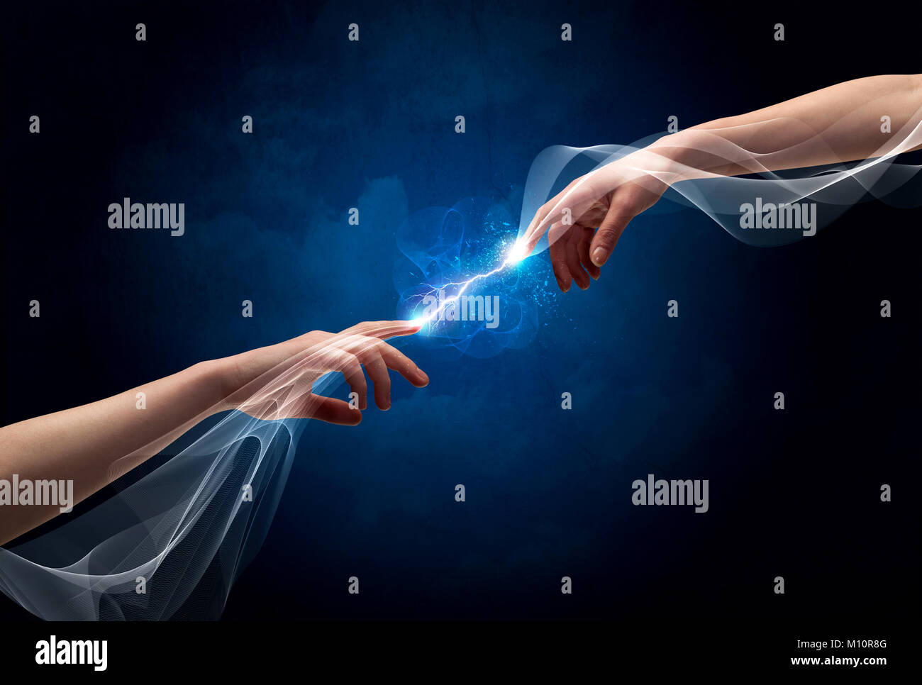Two male arms reaching for each other, with a smoking electric current ...