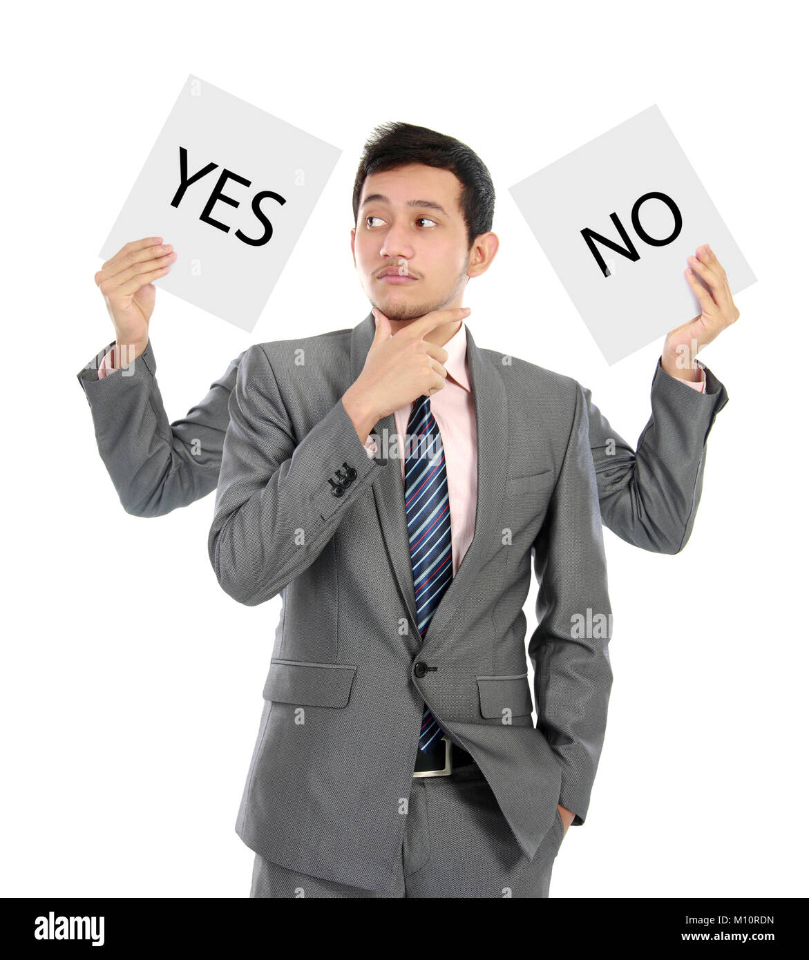 Young business man thinking about making the right decision Stock Photo ...