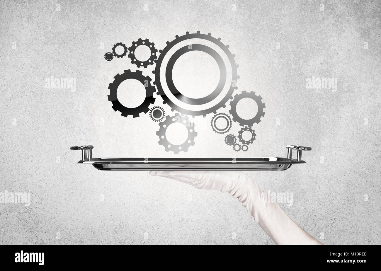 Crank wheel machine working concept with racks served on silver plate ...