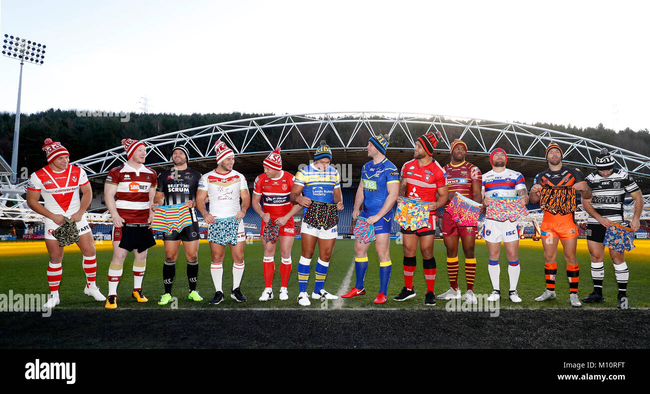 Players pose with sponsors hats and boxer shorts (left to right) St ...