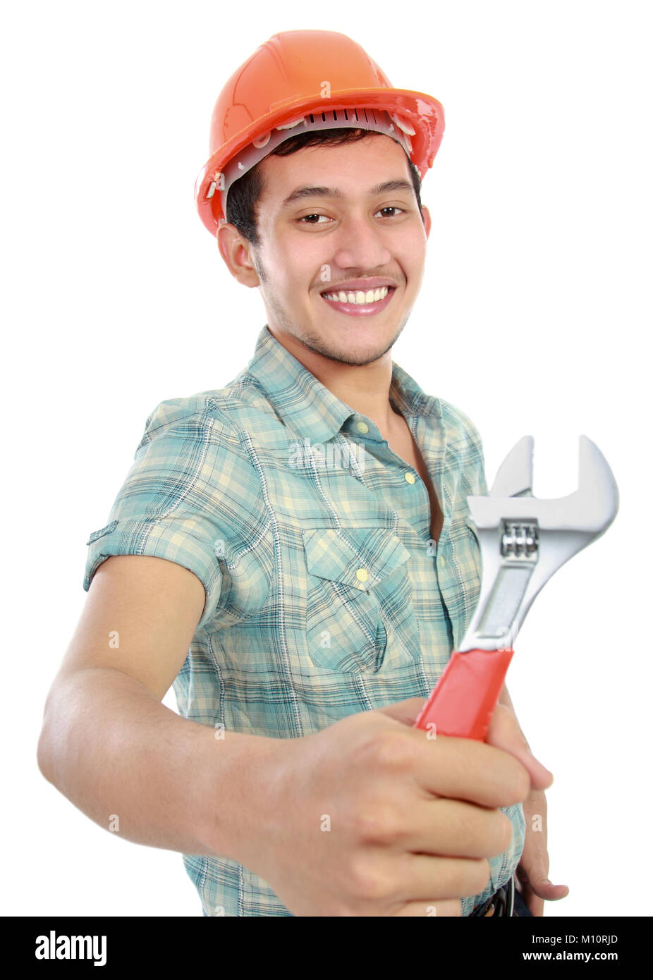 Portrait of an happy worker using wrench isolated against white ...