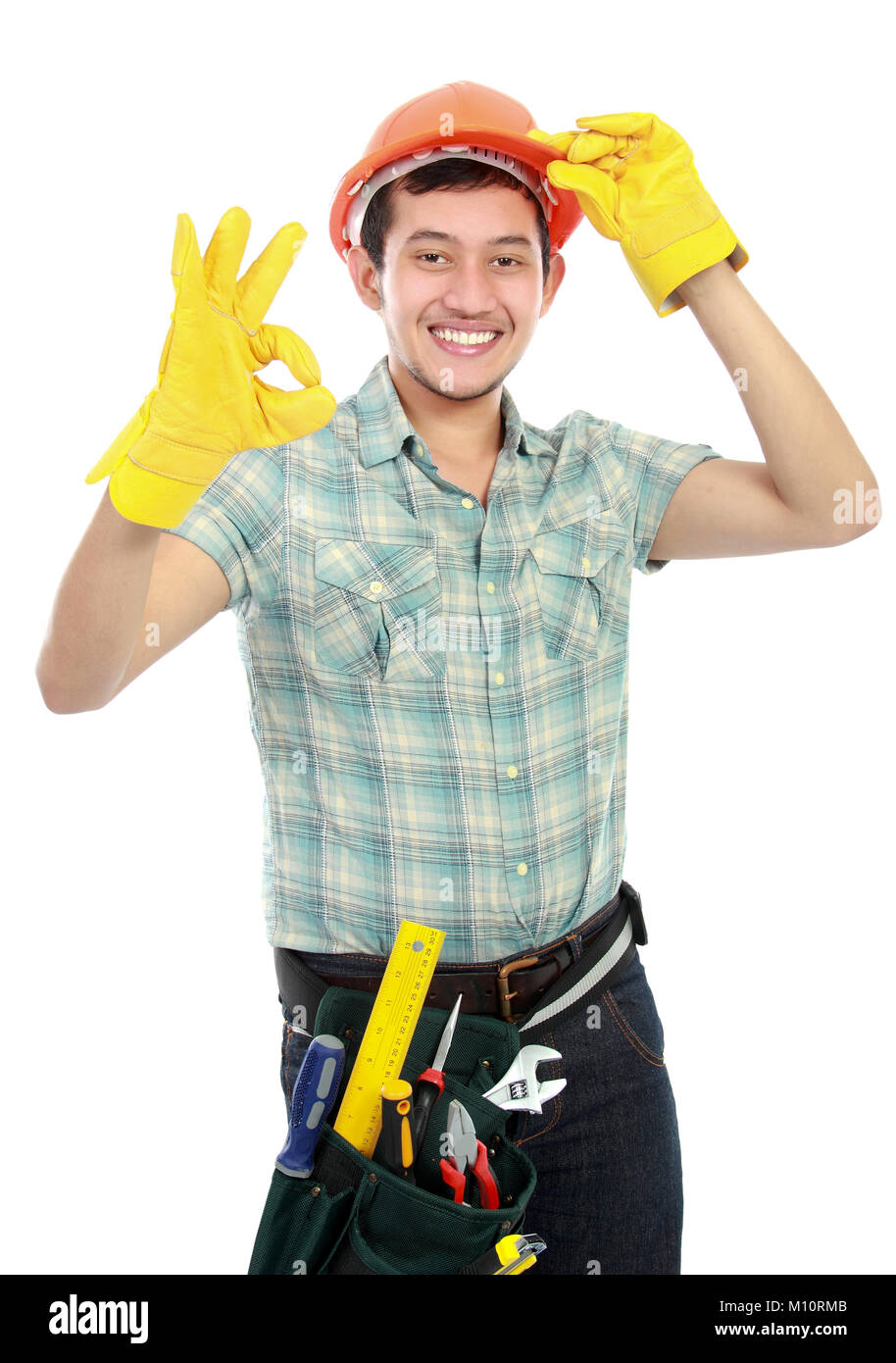 Portrait of an happy worker on white background showing ok sign Stock ...
