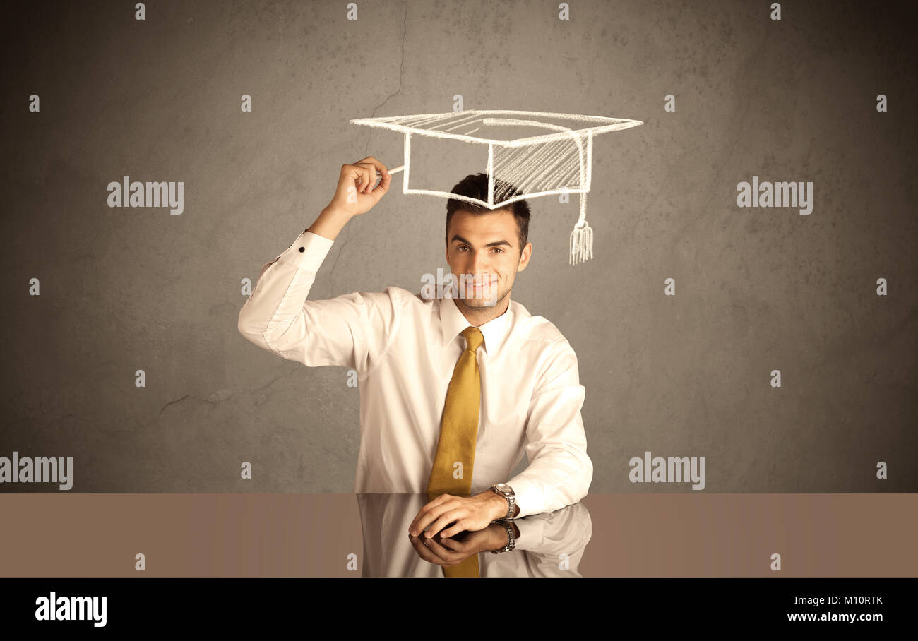 An elegant, successful university student drawing himself a square ...