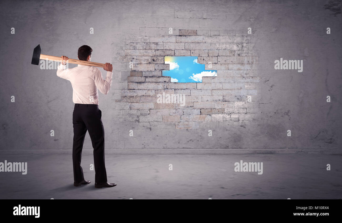 Business man hitting wall hammer hi-res stock photography and images ...