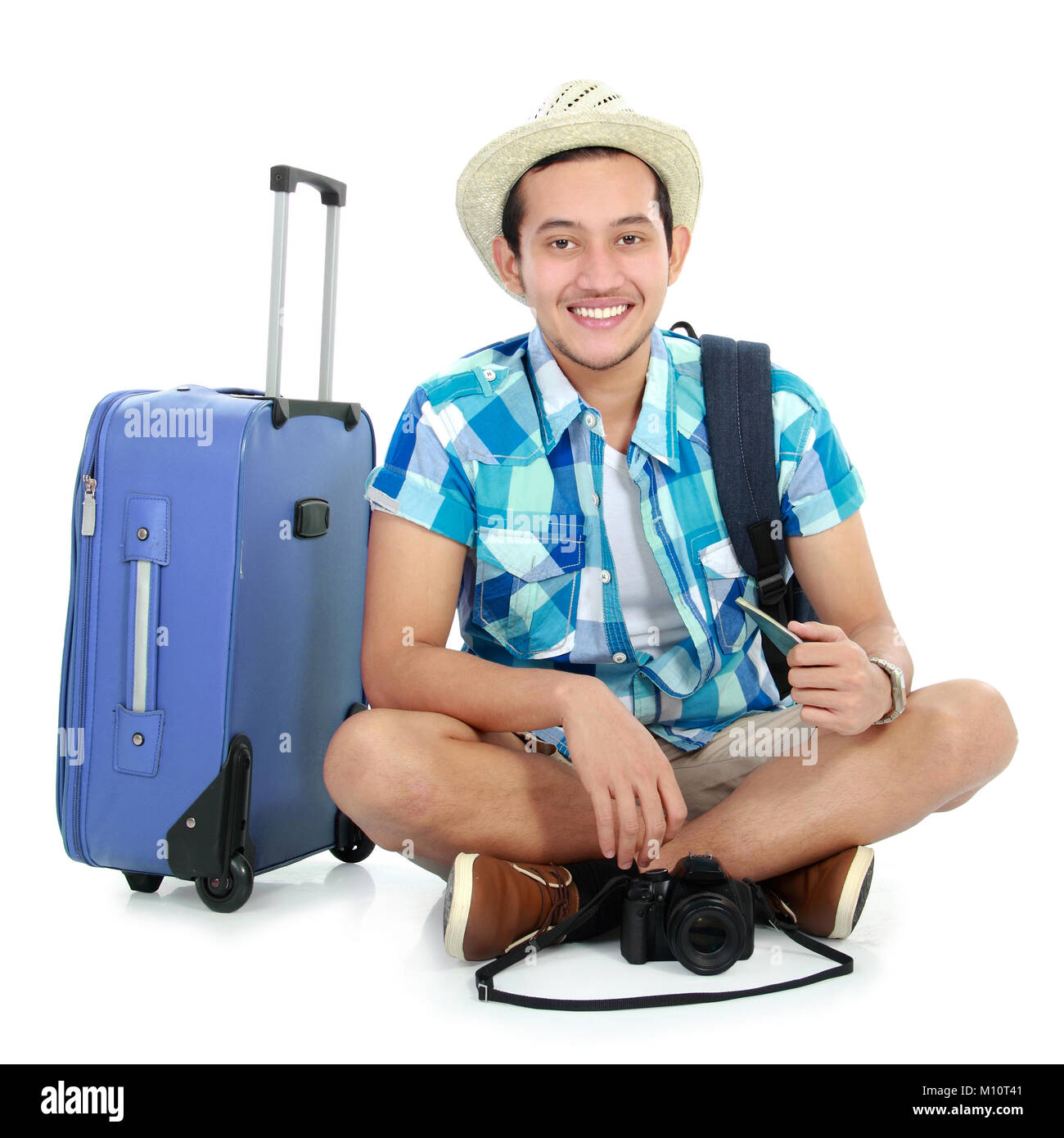 smiling happy tourist sitting on white background Stock Photo - Alamy