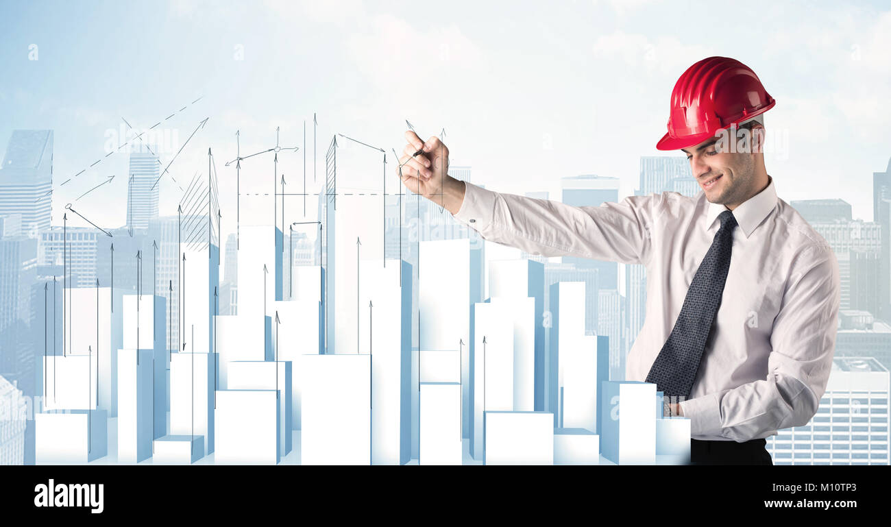 A happy construction worker drawing a city with white, plain buildings ...