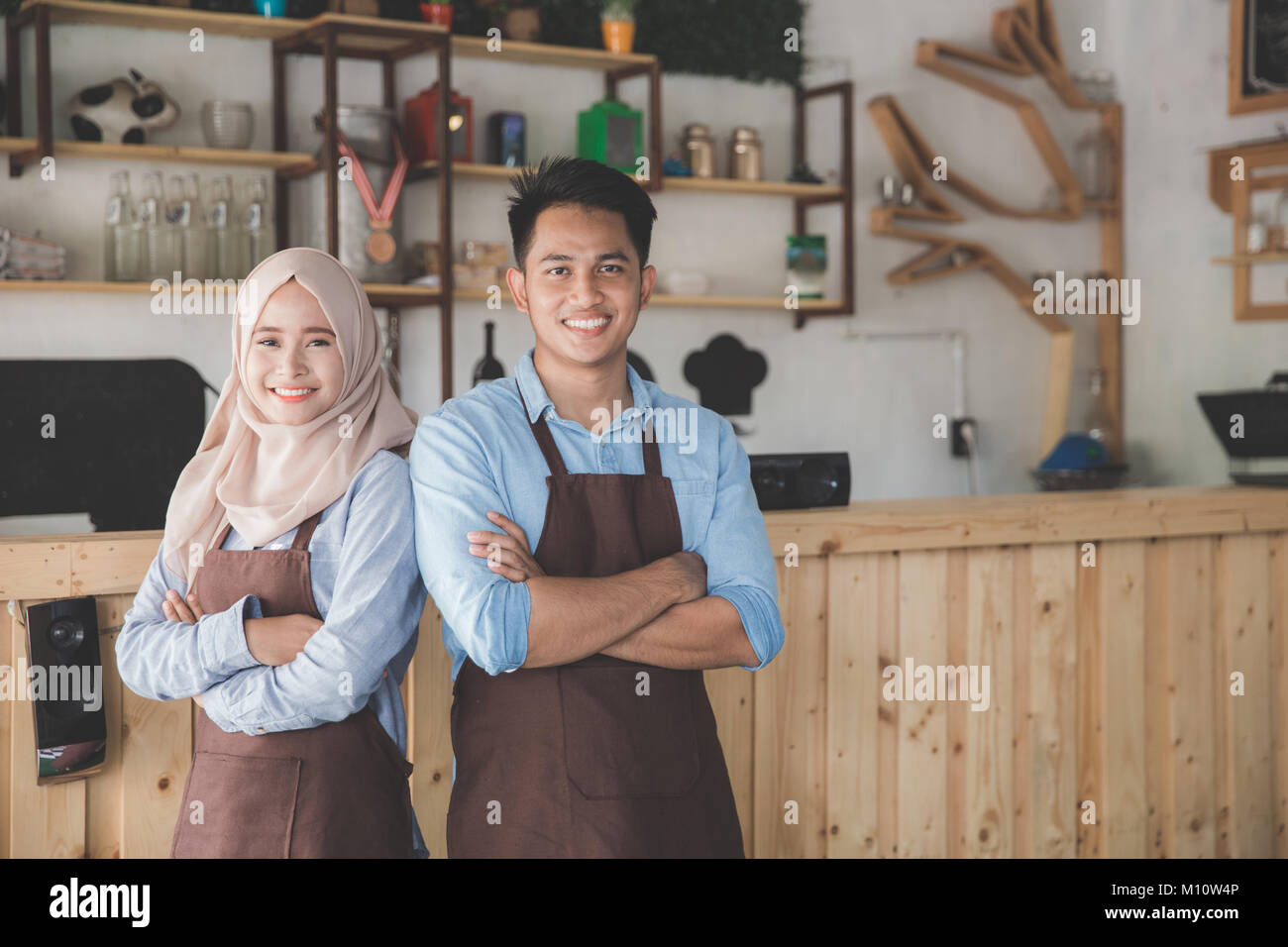 Muslim man restaurant owner hi-res stock photography and images - Alamy