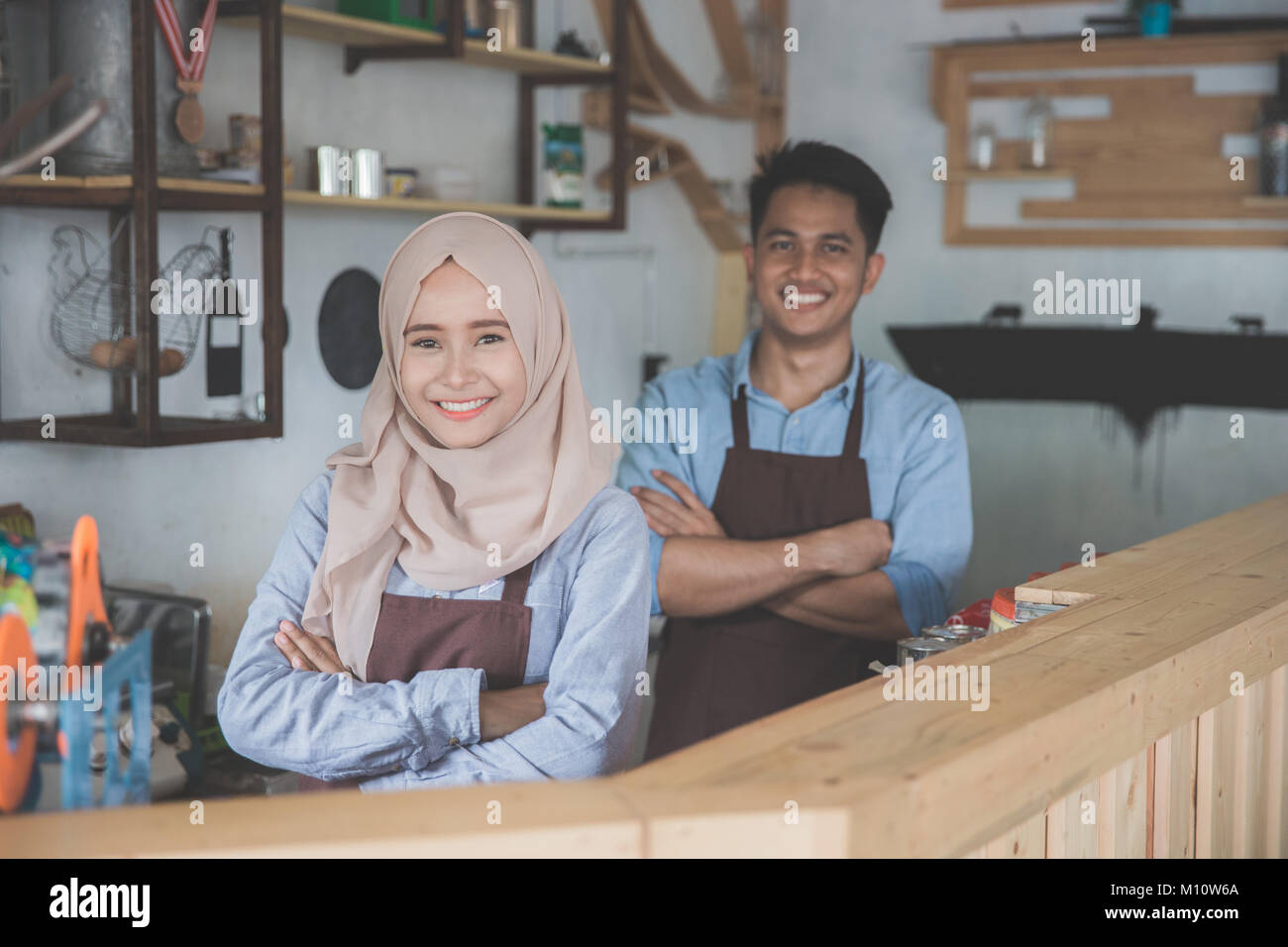 Muslim man restaurant owner hi-res stock photography and images - Alamy