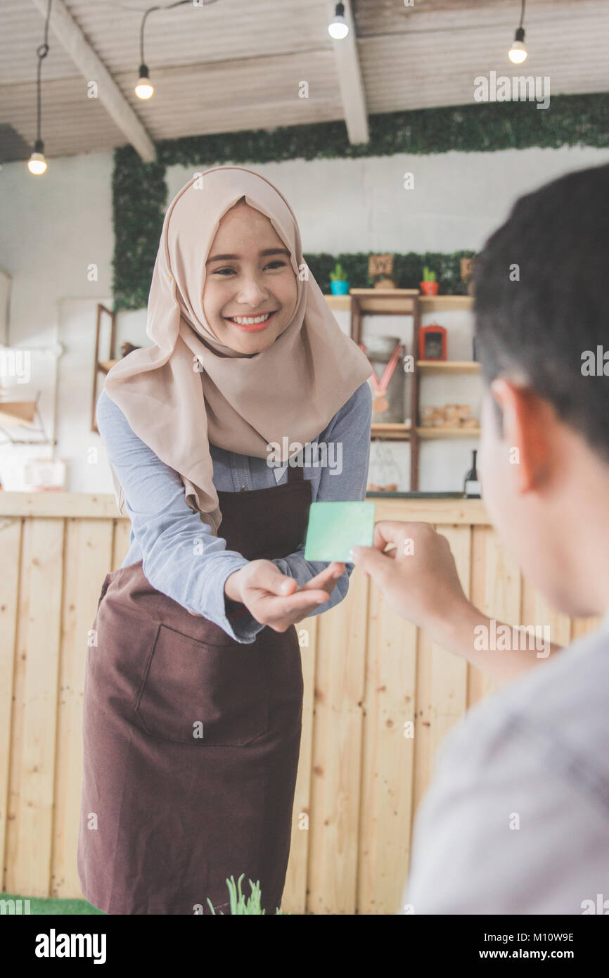Customer paying bills using hi-res stock photography and images - Alamy