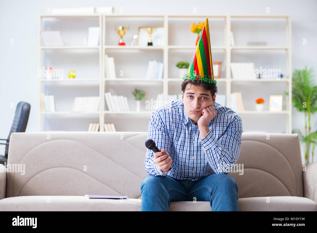 Funny man singing songs in karaoke at home Stock Photo - Alamy