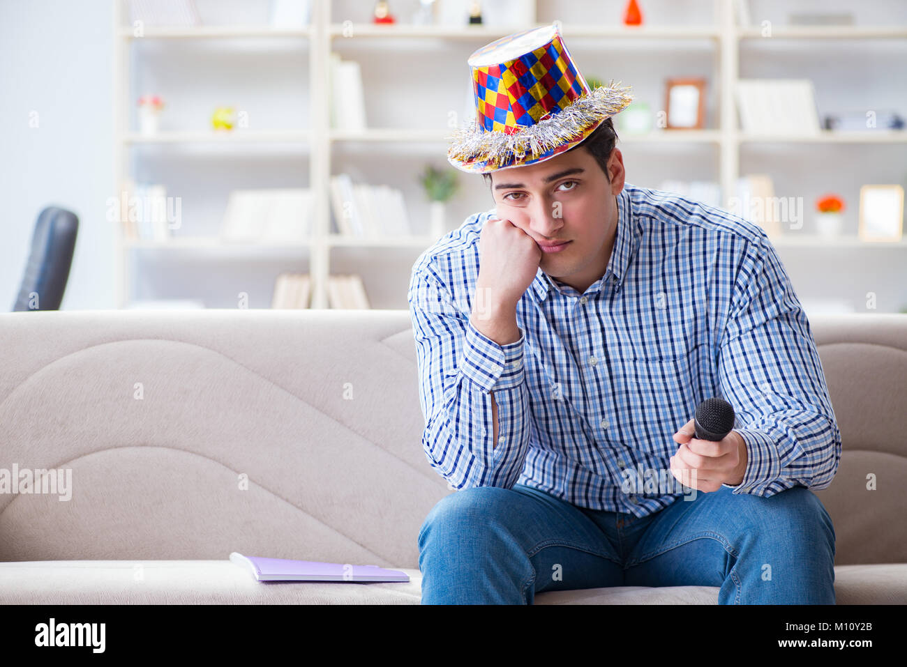 Funny man singing songs in karaoke at home Stock Photo - Alamy