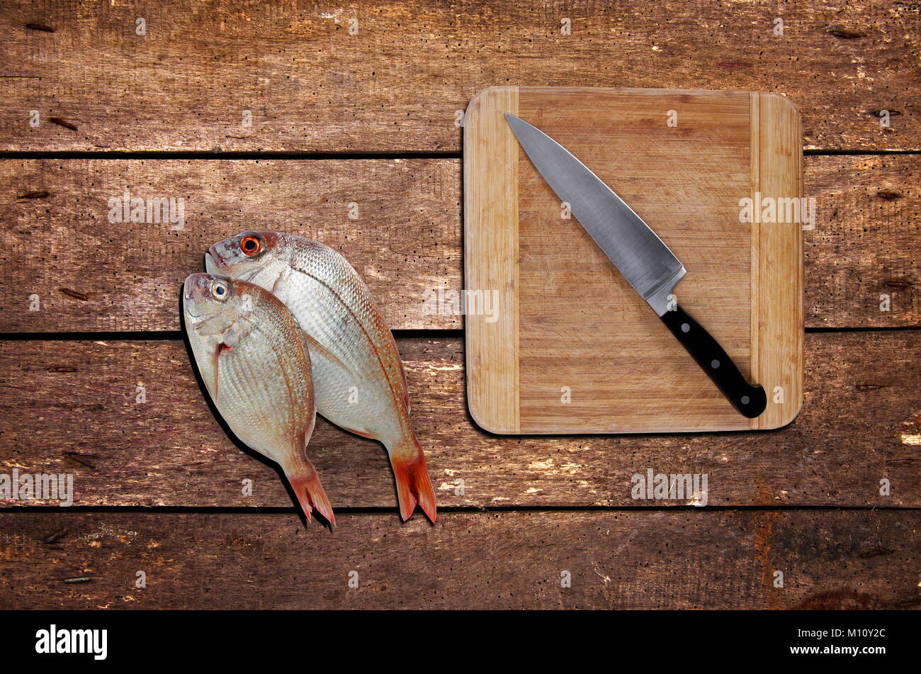 Fish on the table Stock Photo - Alamy