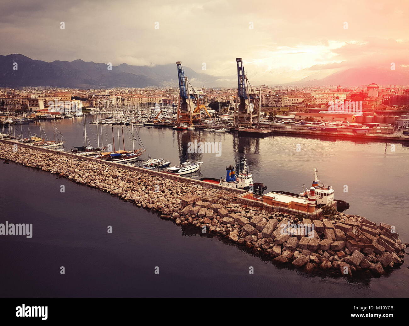 Ship port in the sunset. Italy Stock Photo - Alamy