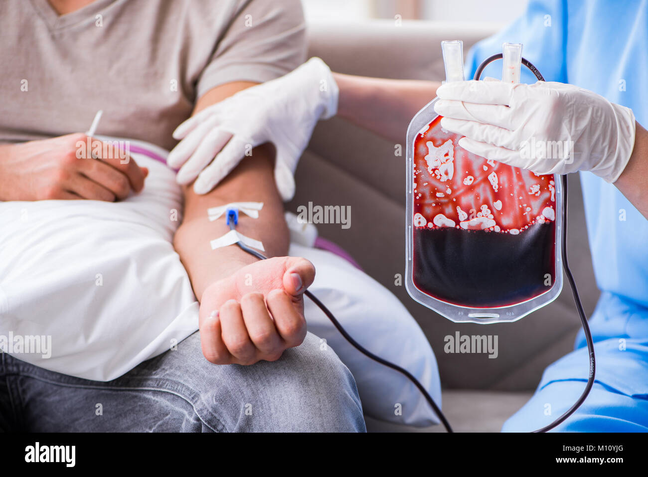 Patient getting blood transfusion in hospital clinic Stock Photo - Alamy