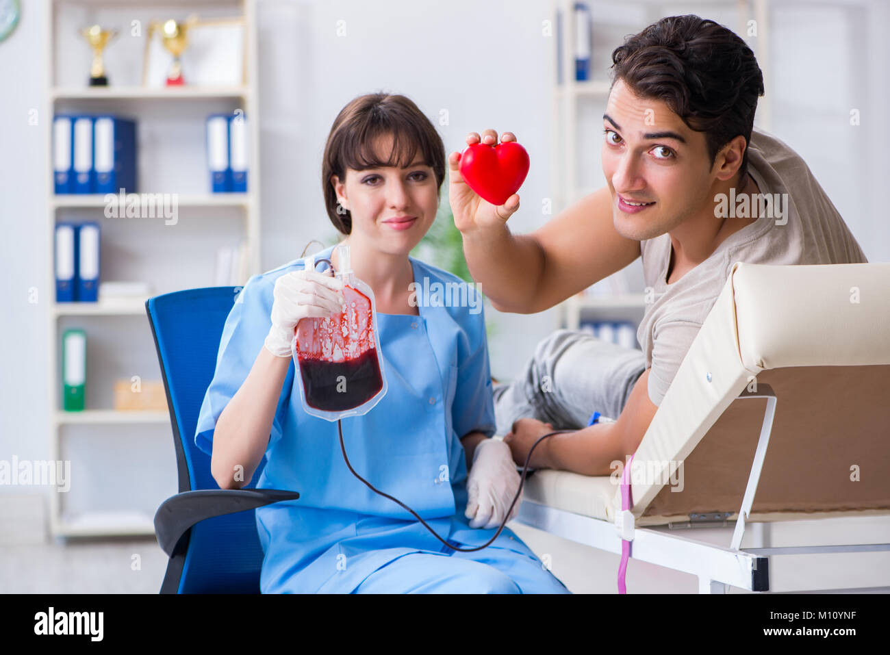 Patient getting blood transfusion in hospital clinic Stock Photo - Alamy