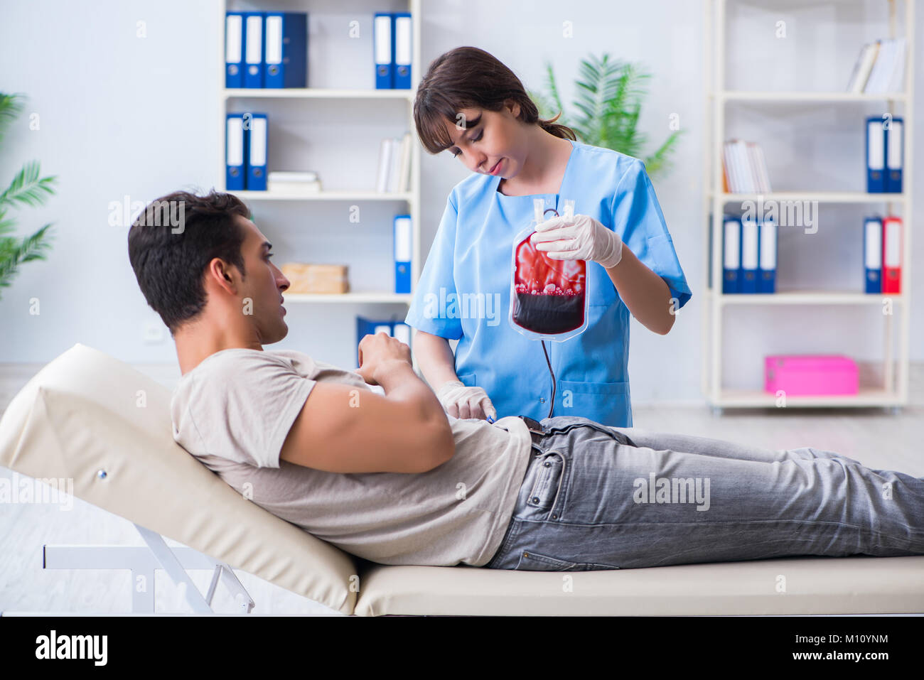 Patient getting blood transfusion in hospital clinic Stock Photo - Alamy