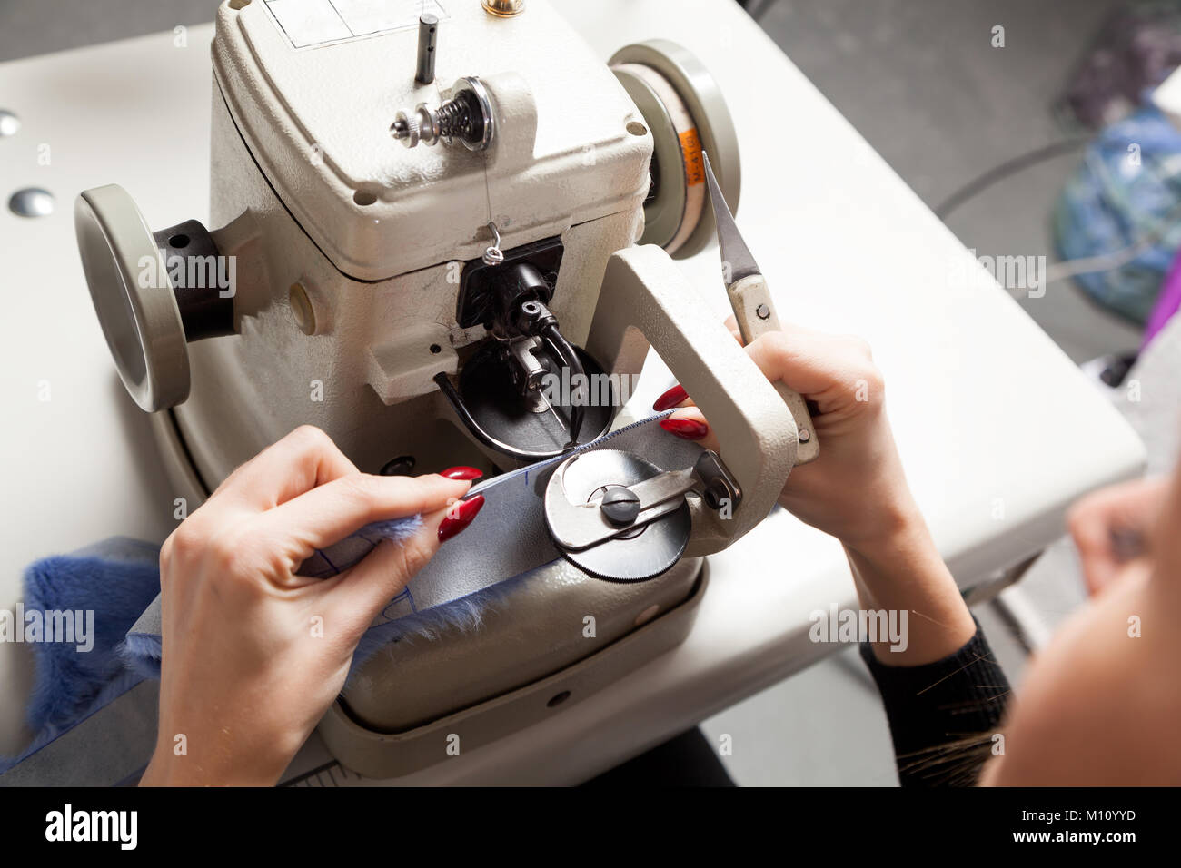Woman works on sewing machine hi-res stock photography and images - Alamy