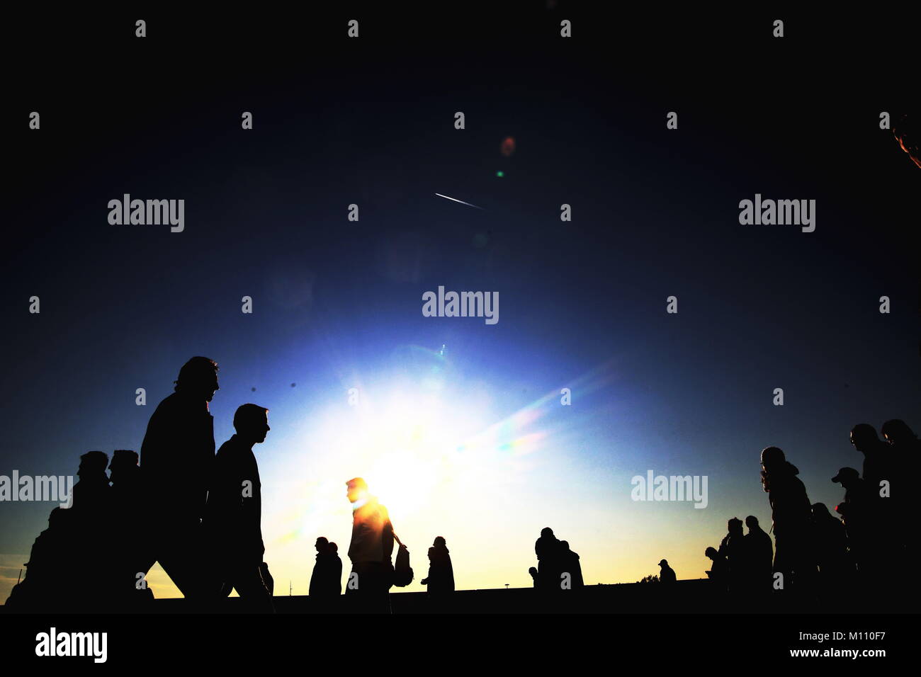 public place people crowd sunset Stock Photo - Alamy