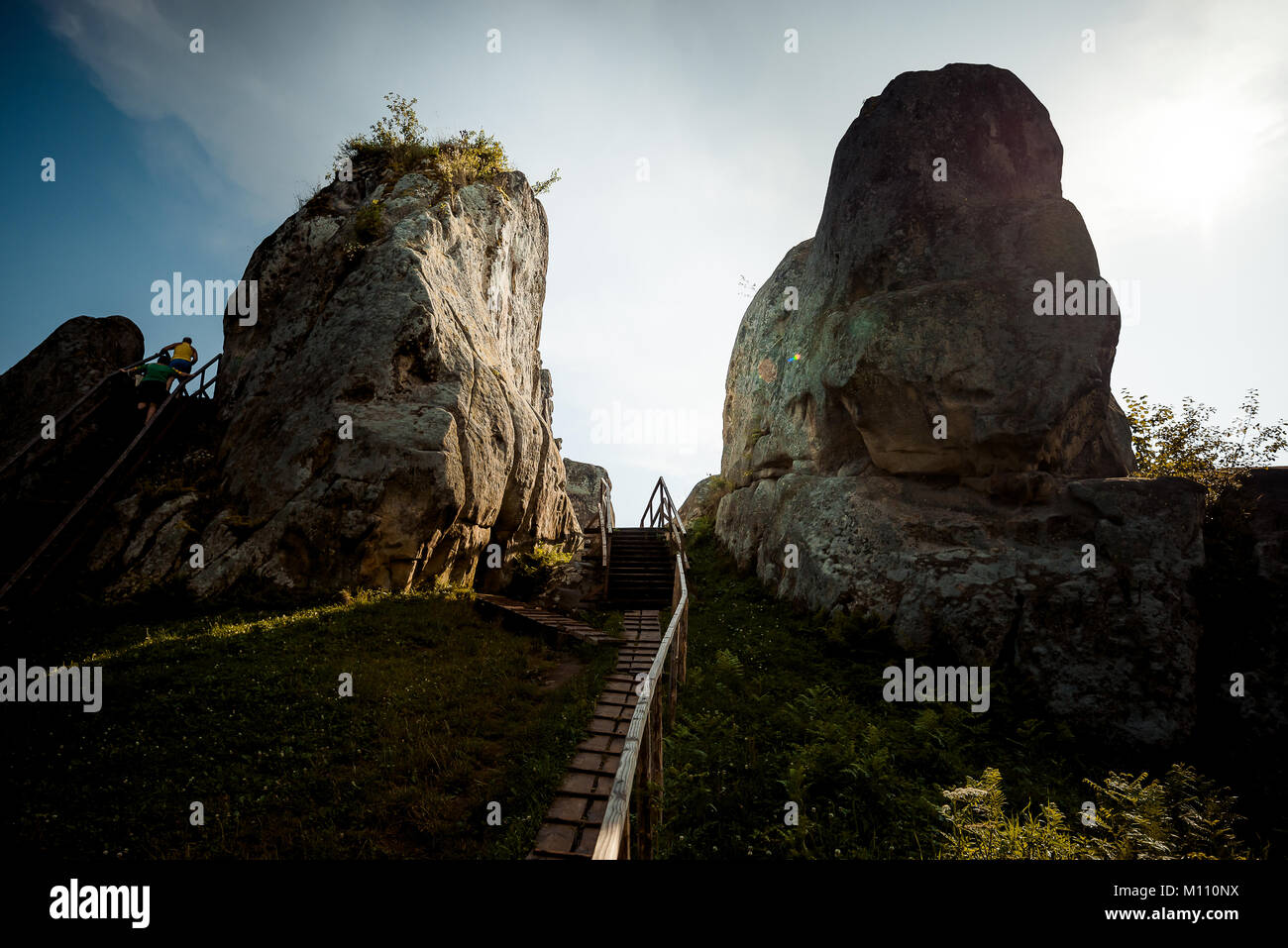 Beautiful landscape. The wooden staircases between two rocks during the ...