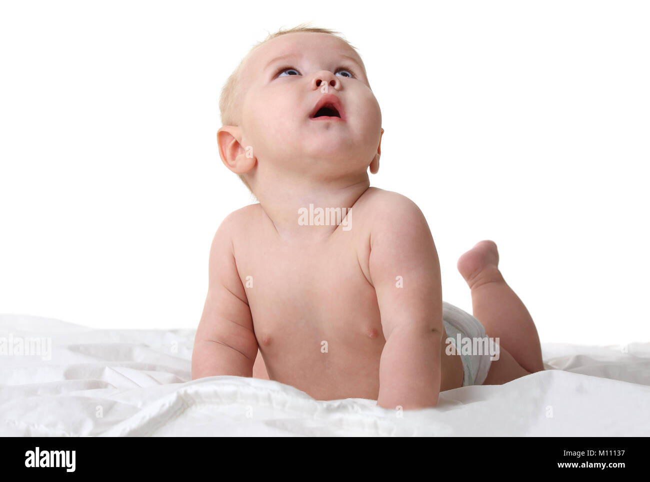 Little surprised baby looking up - isolated on white Stock Photo - Alamy