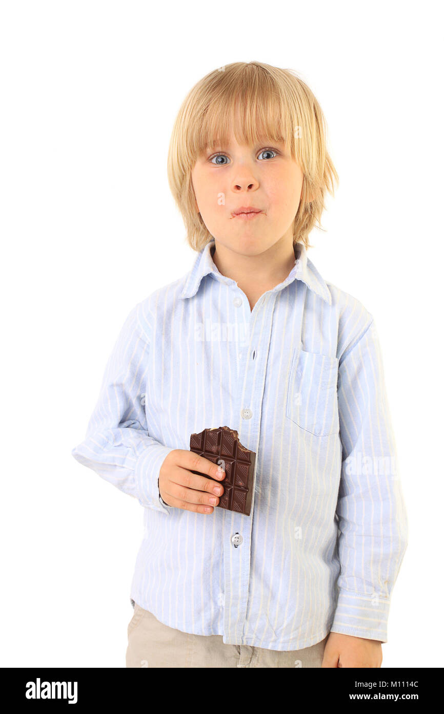happy child eating chocolate isolated on white. Series Stock Photo - Alamy
