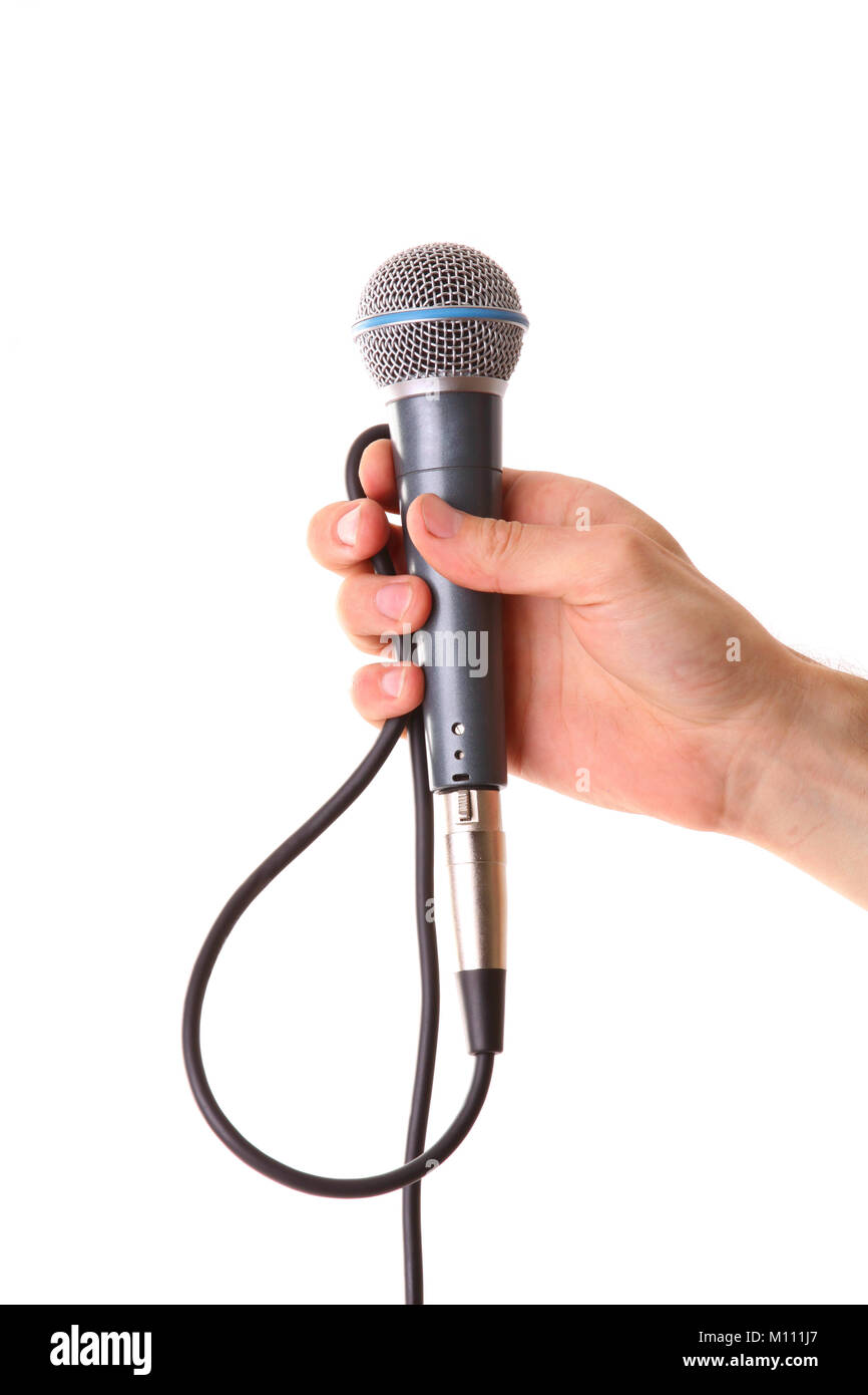 Hand holding microphone on white hi-res stock photography and images ...