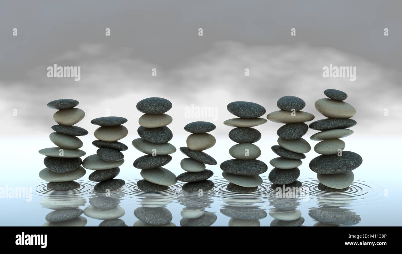 Group of Pebble stacks on water level. Harmony and balance Stock Photo ...