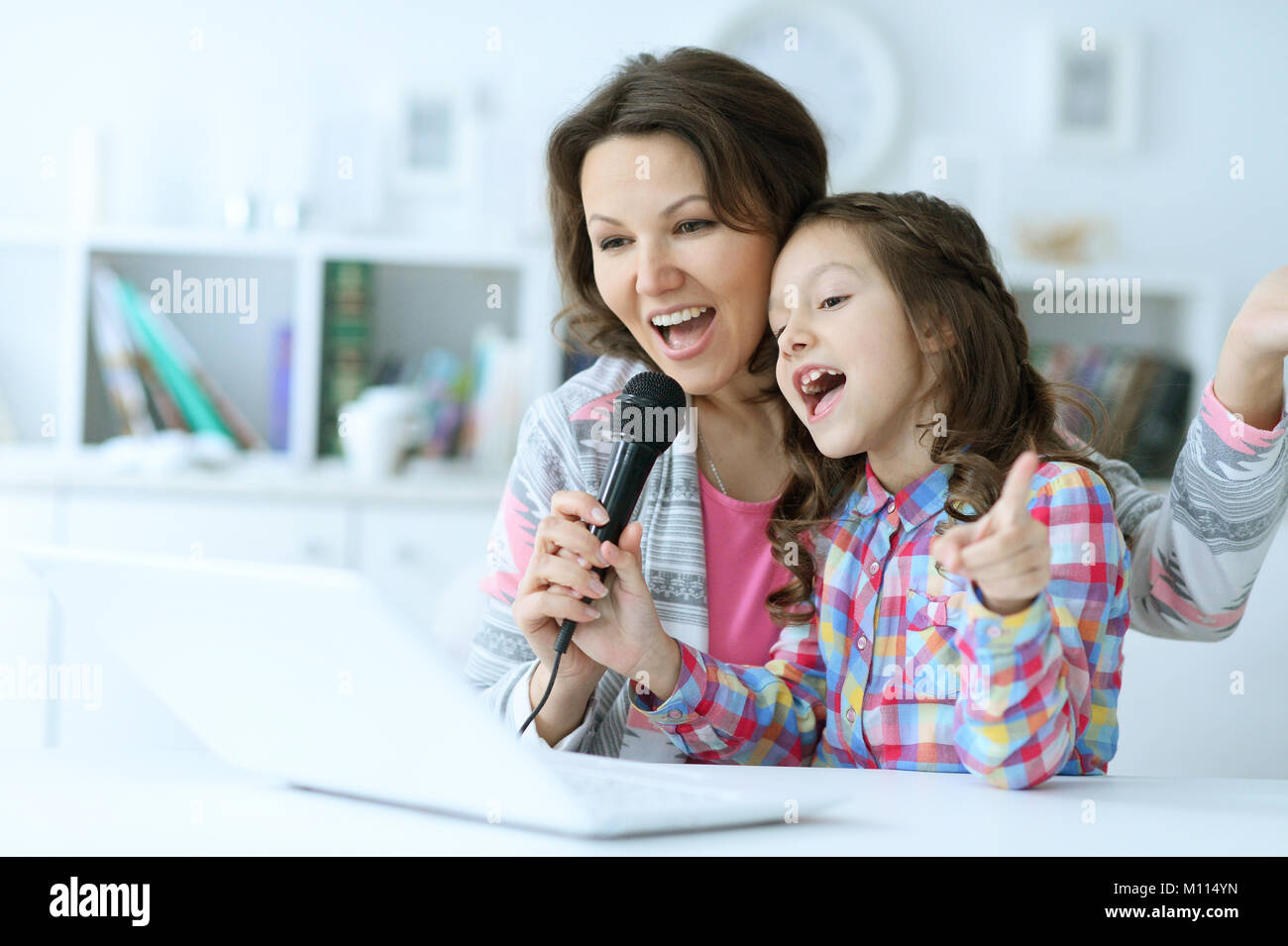 little girl singing karaoke Stock Photo - Alamy