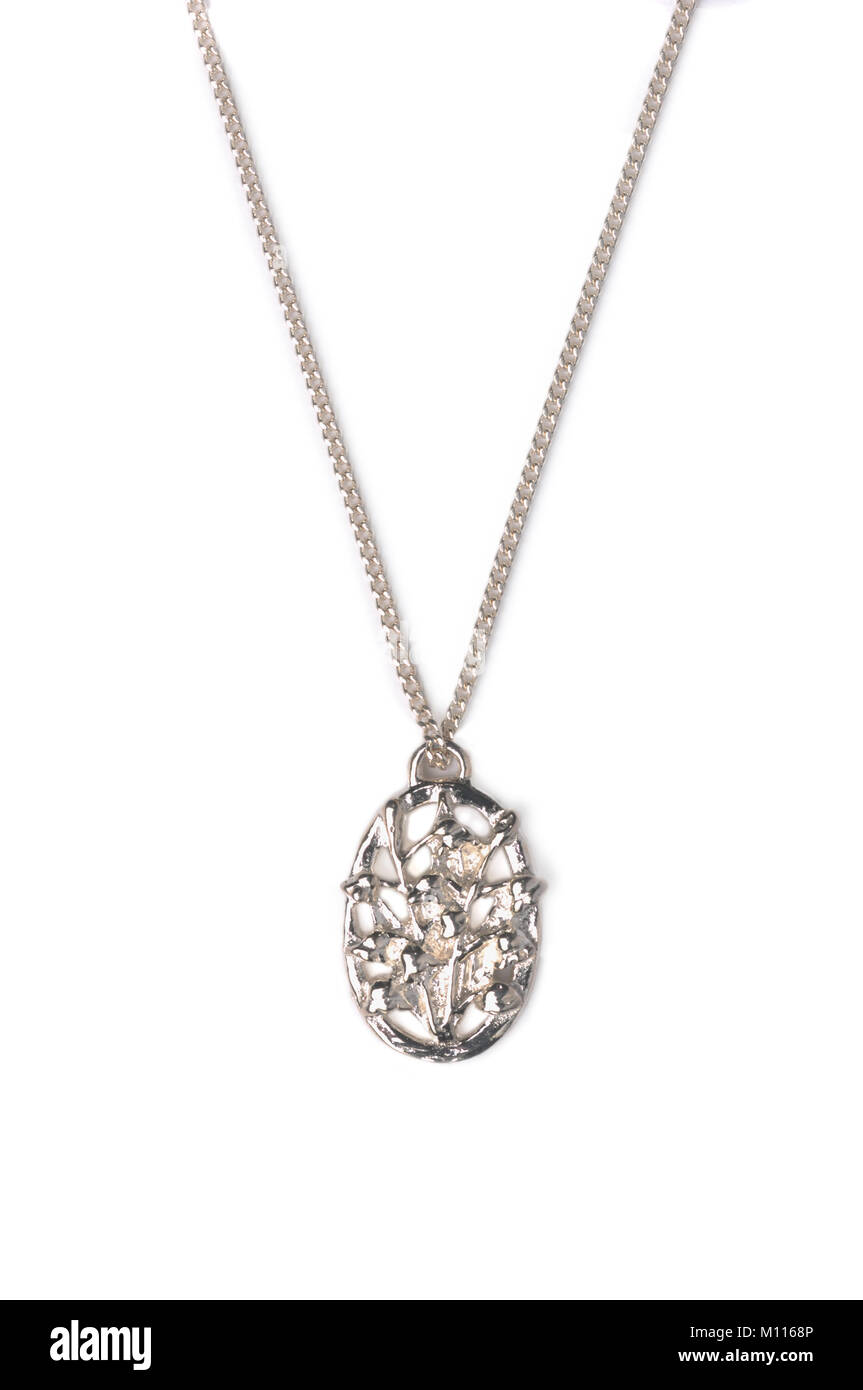 Studio shot of a single pendant necklace cut out against a white ...