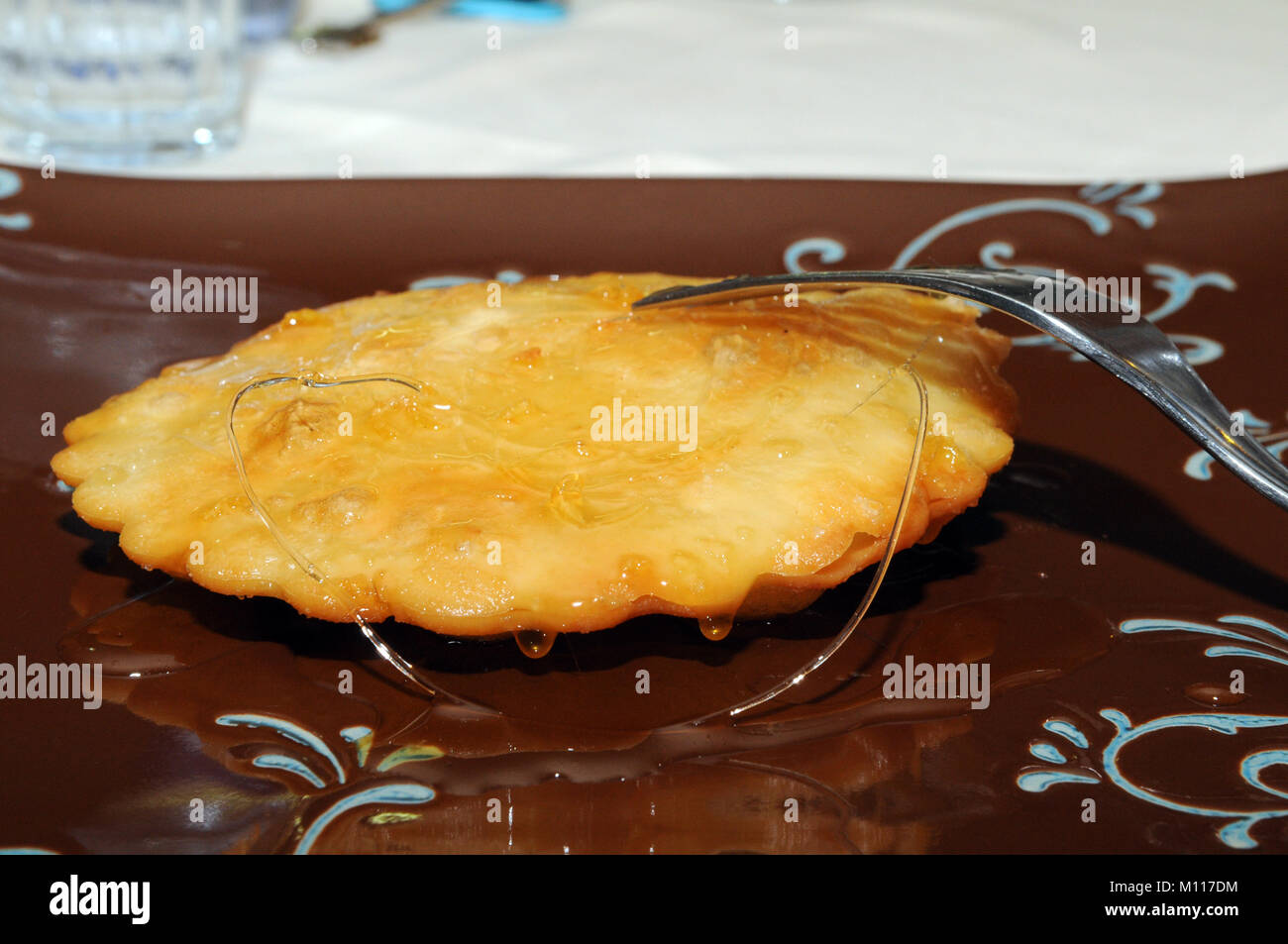 Seadas, local cheese and honey dessert pie, Sardinia, Italy Stock Photo ...