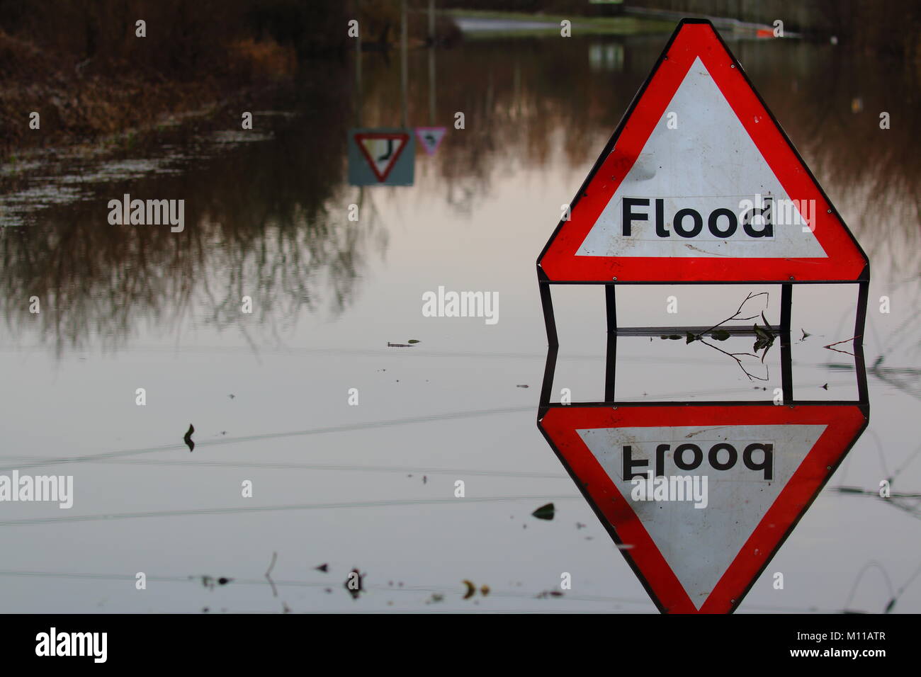 Reflecting Flood Sign Stock Photo - Alamy