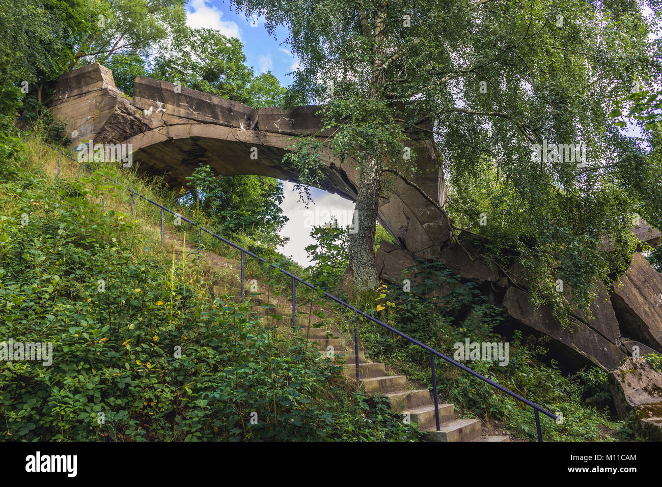 Old destroyed railway bridge over Sapina river in Kruklanki village ...