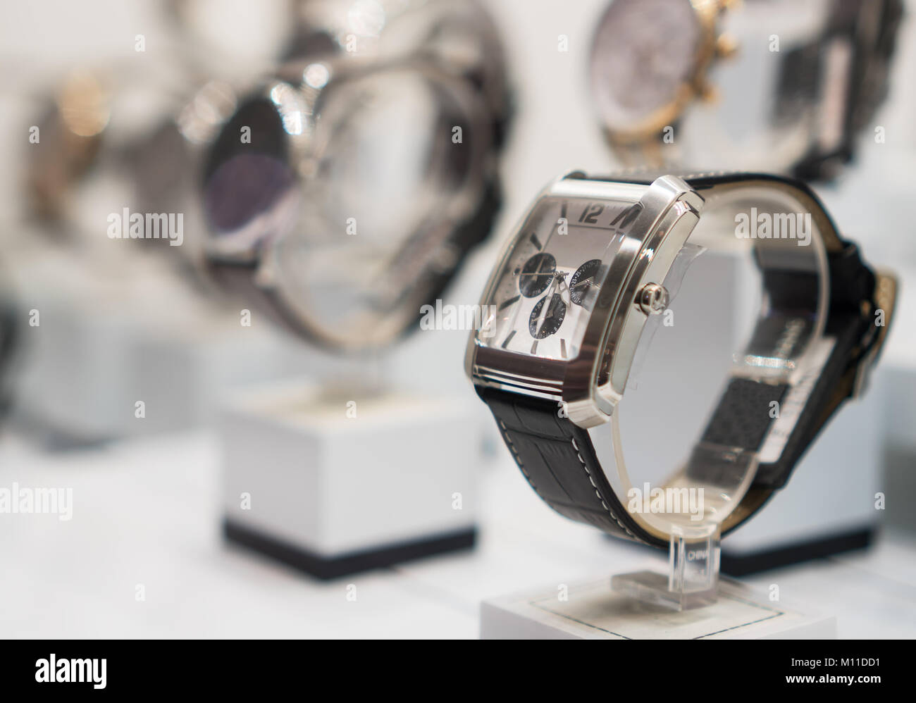 Collection of modern watches in the shop window Stock Photo - Alamy