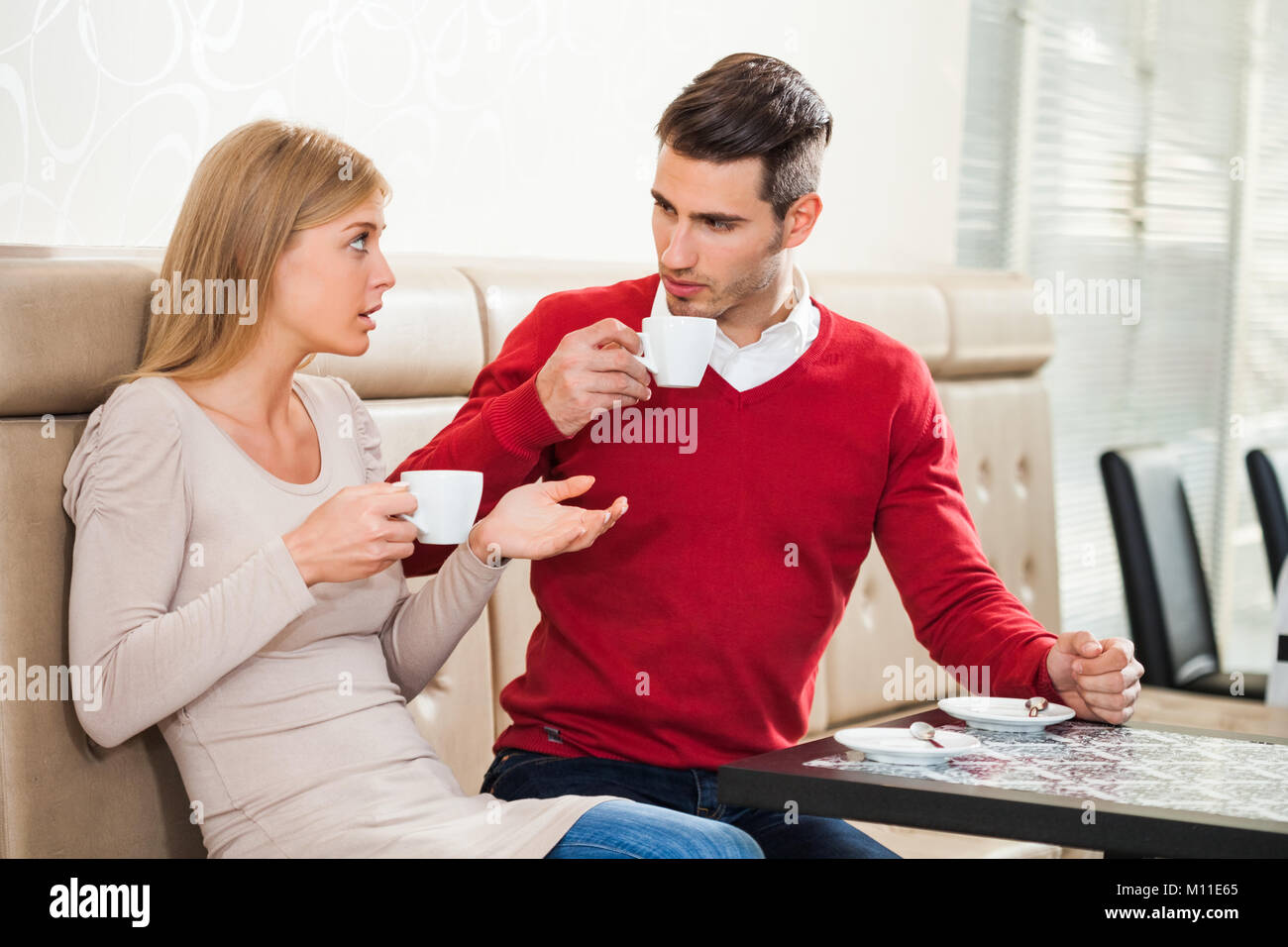 Friend talking serious hi-res stock photography and images - Alamy