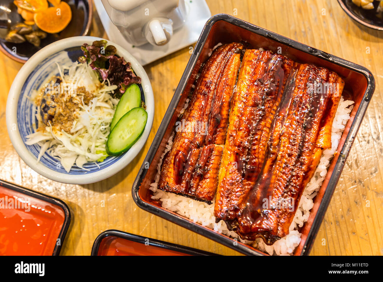 Unagi, cooked Japanese fresh water eel, over rice - a popular Japanese ...