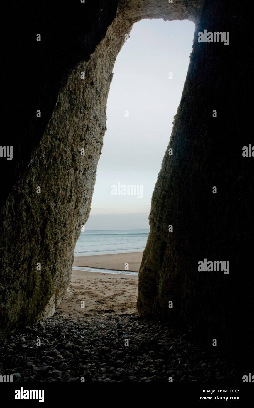 Cave mouth White Rocks Northern Ireland Stock Photo - Alamy