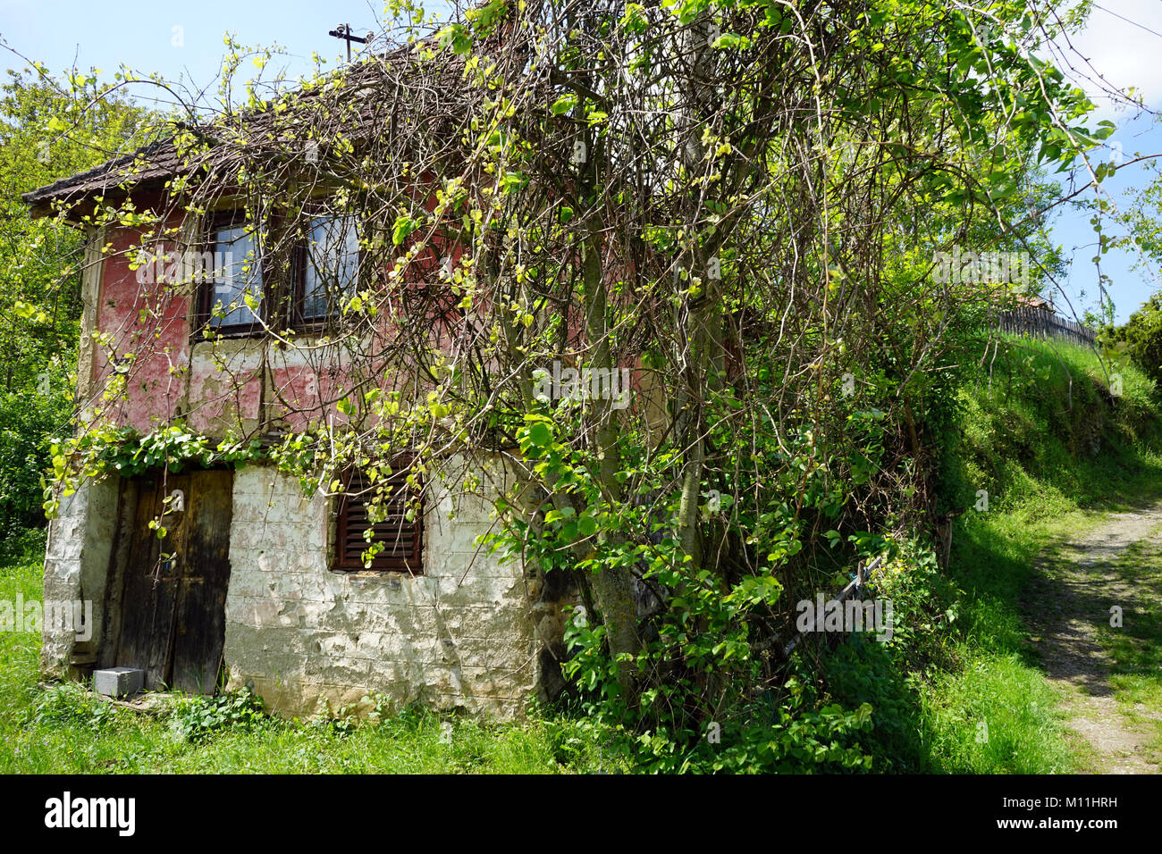 Corner of old house in the village Stock Photo - Alamy