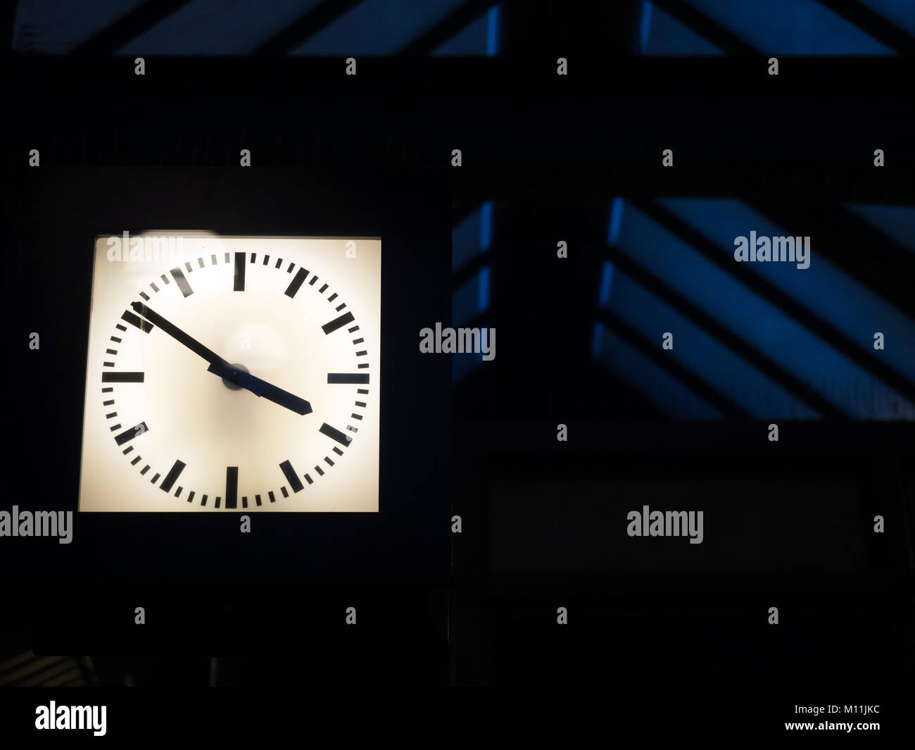 Analog big clock with light in a train station in Berlin, Germany Stock ...