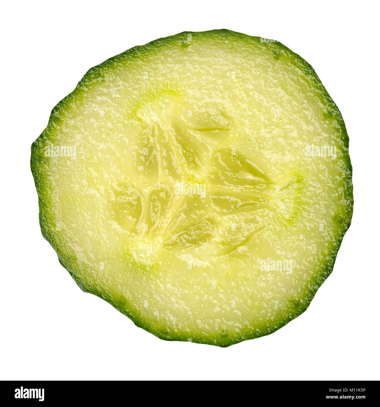 slice cucumber isolated on a white background Stock Photo - Alamy