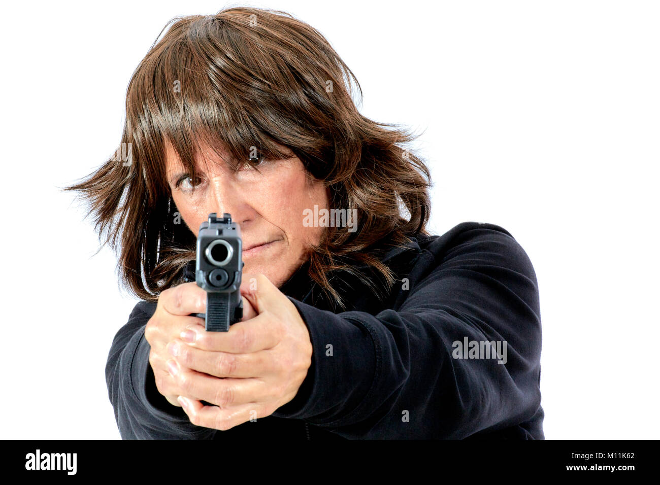 Pretty woman with pistol hi-res stock photography and images - Alamy