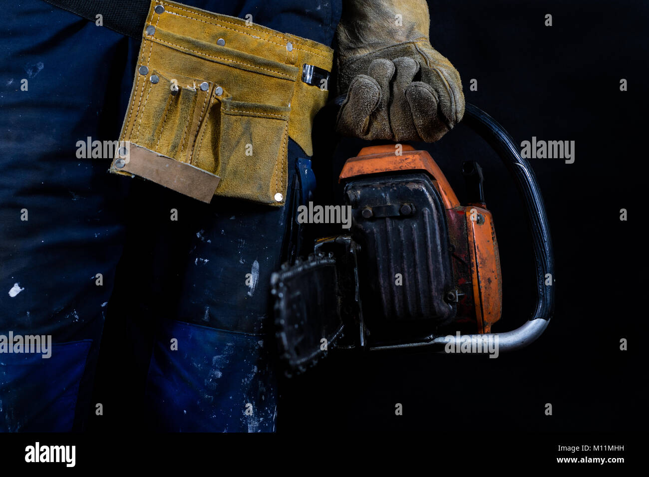Workwear for production workers. A construction worker holding ...