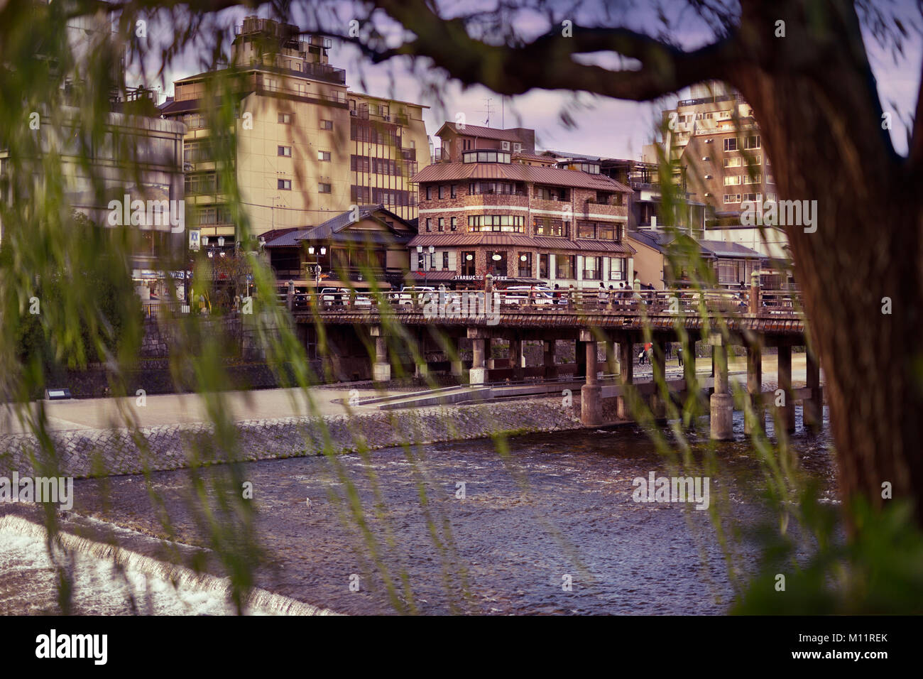 Artistic sunset scenery of Sanjo Ohashi, historic bridge over Kamo ...