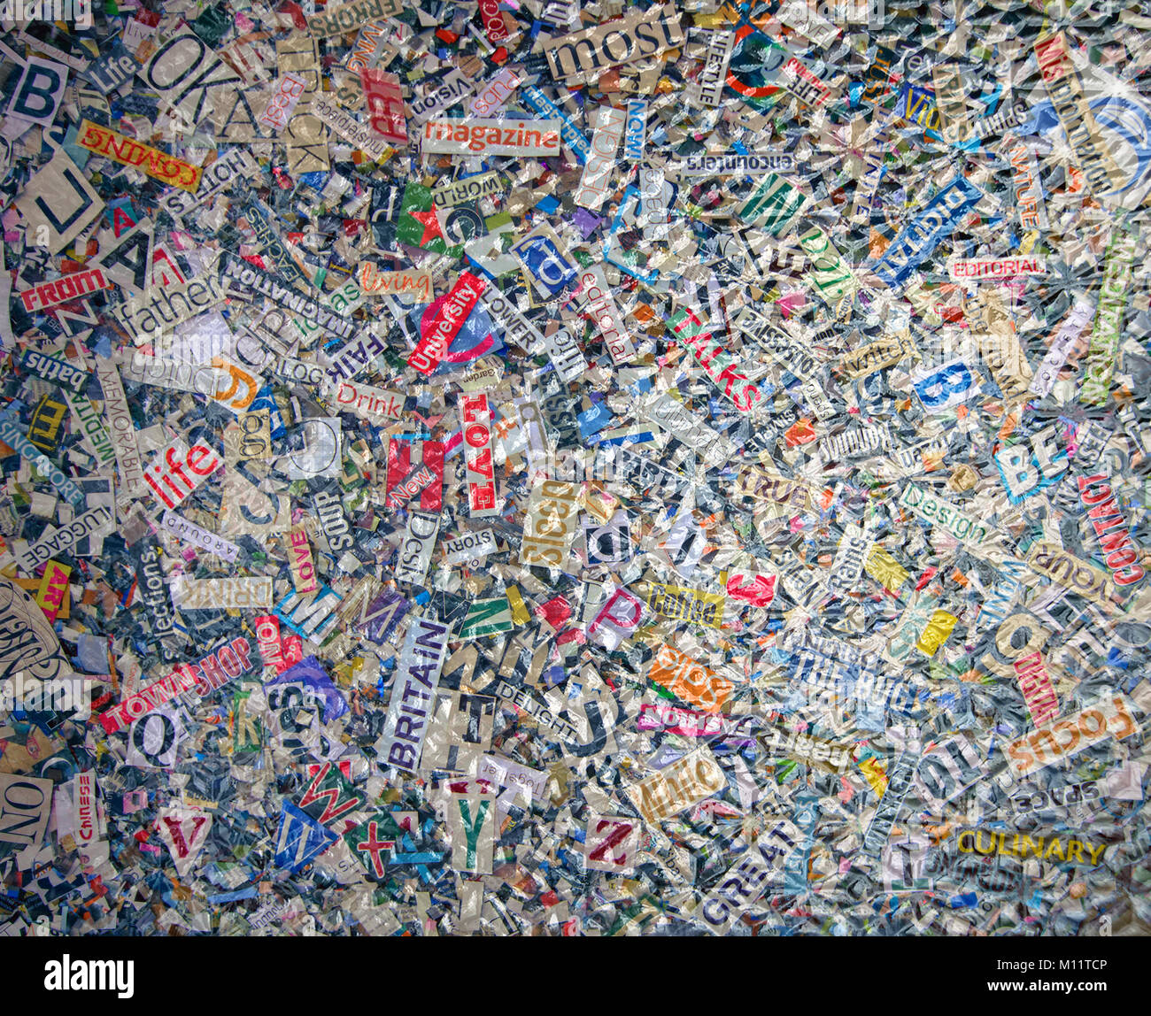 random magazine letters and words under a pice of textured glass Stock ...