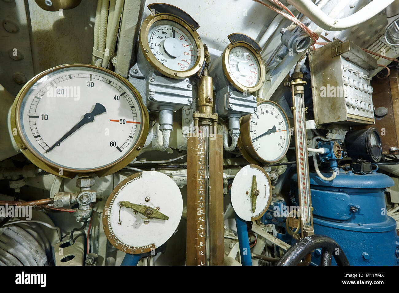 Antique manometers measuring instruments with control valves. Submarine ...