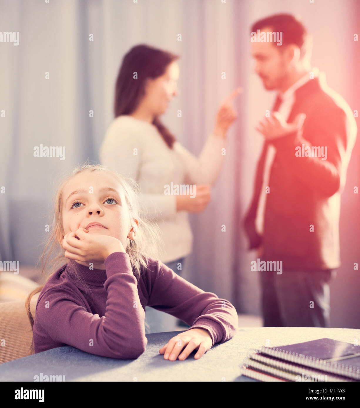 Parents arguing with teenager listening hi-res stock photography and ...